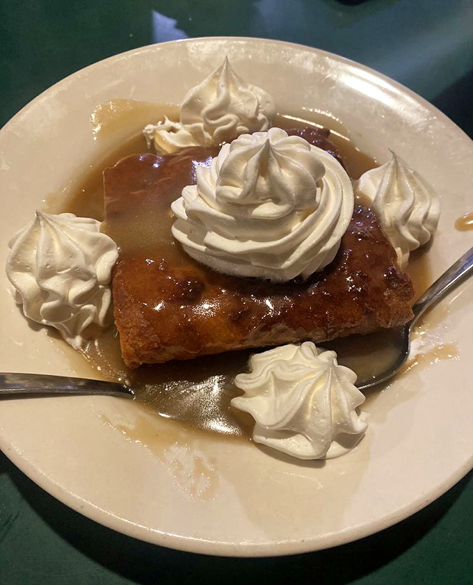 Bread pudding that would make your grandmother both jealous and proud. Those dollops of whipped cream aren't decorative—they're essential.