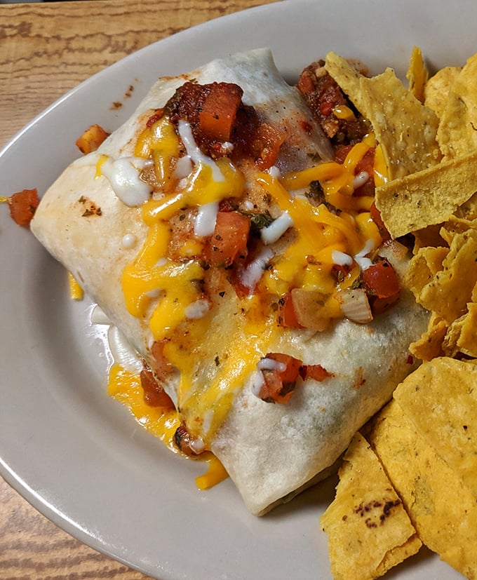 Breakfast burritos should always look this good—cheese melting like a sunset, with fresh salsa standing by to kick your morning into high gear.