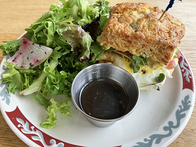 This isn't just a breakfast sandwich—it's morning architecture with a side salad playing the responsible adult role.