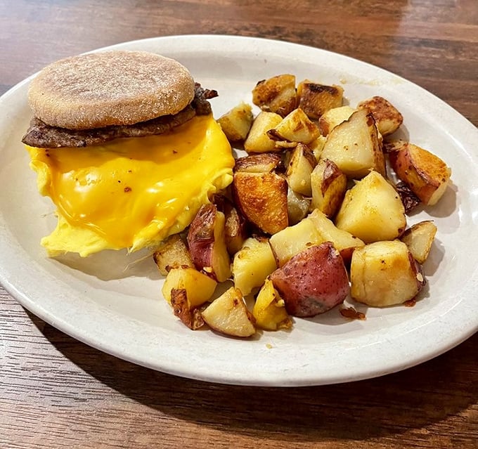 Breakfast sandwich perfection—where the English muffin, egg, and cheese create the holy trinity of morning satisfaction.