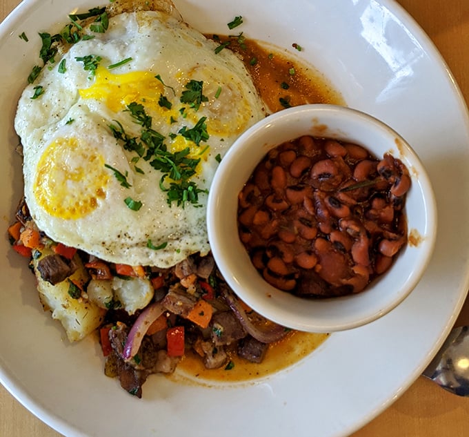 Morning redemption on a plate. This brisket hash with its sunny-side-up companion is the breakfast equivalent of hitting all green lights on your commute.
