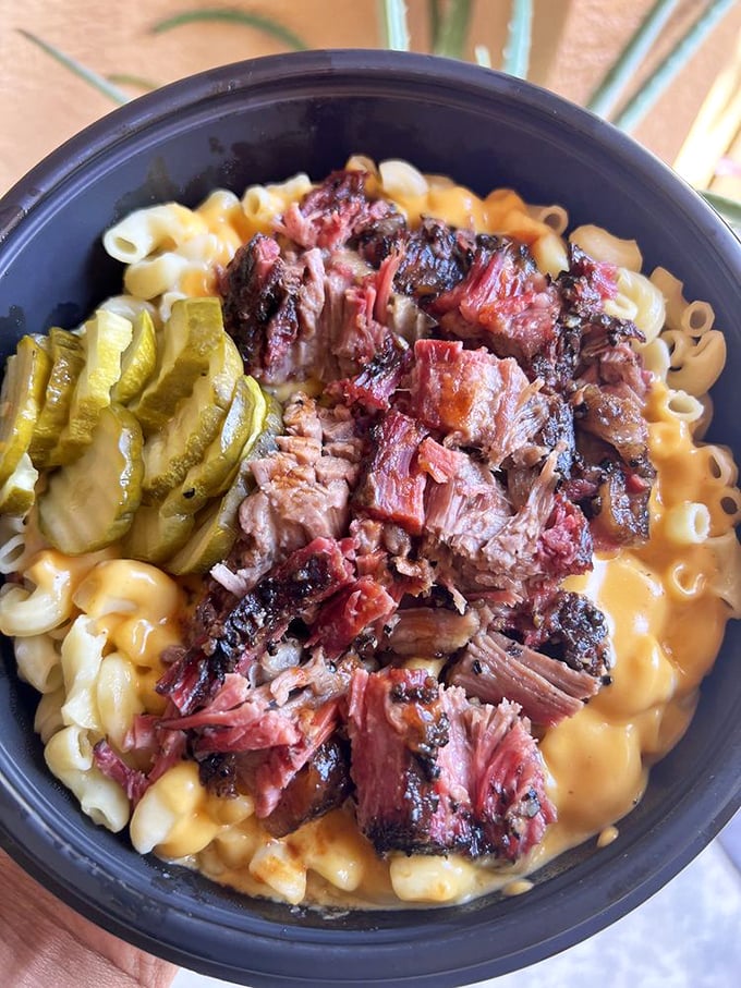 The legendary Brisket Mac Bowl—where comfort food meets craft barbecue in a marriage that would make Cupid put down his bow and pick up a fork.