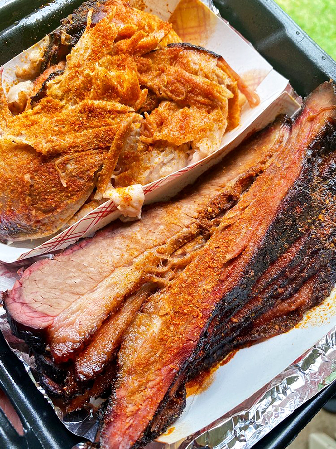 Behold the barbecue promised land! That bark on the brisket looks like it was carved from smoky heaven, while the pulled pork waits patiently for its moment in the spotlight.