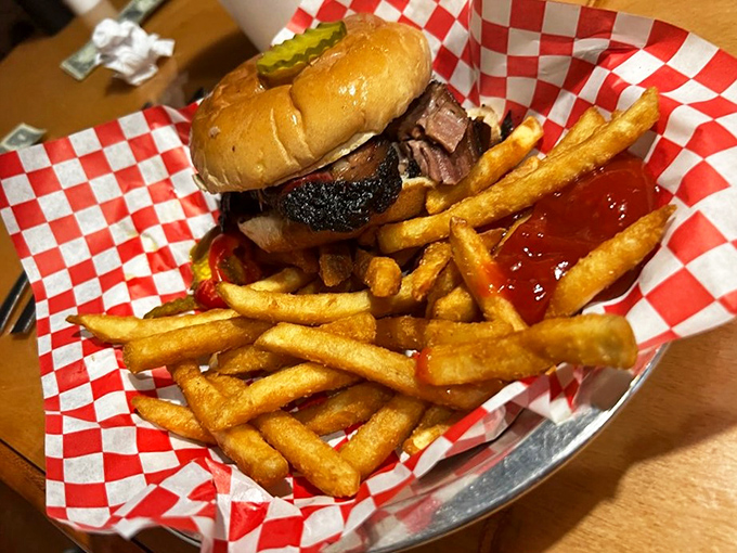 Not just a sandwich, but a monument to brisket perfection. Those fries aren't just sides—they're supporting actors in a meaty drama.