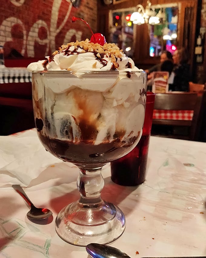 A brownie sundae that doesn't just satisfy your sweet tooth—it throws a party for it, complete with whipped cream, nuts, and that essential cherry on top.