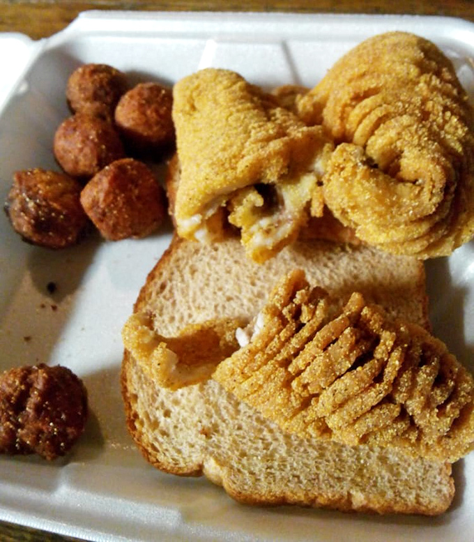 The sandwich that launched a thousand road trips. Buffalo fish on white bread with a dollop of tartar sauce – simplicity elevated to art.