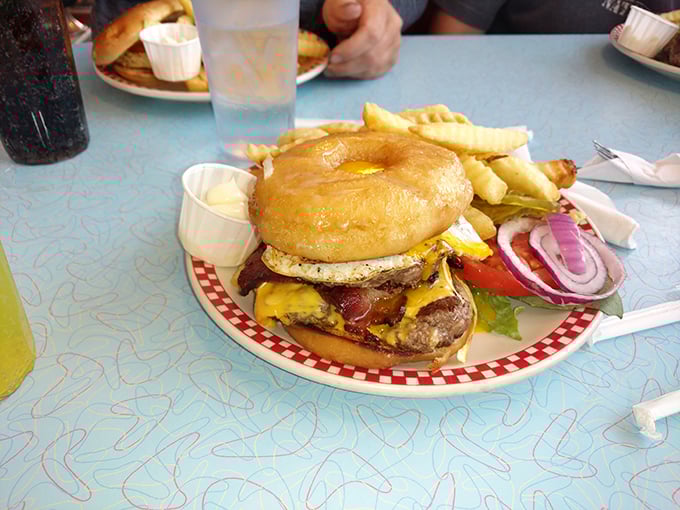 Not just a burger, but a towering monument to the art of excess—where the egg and cheese aren't toppings but essential supporting actors in this delicious drama.