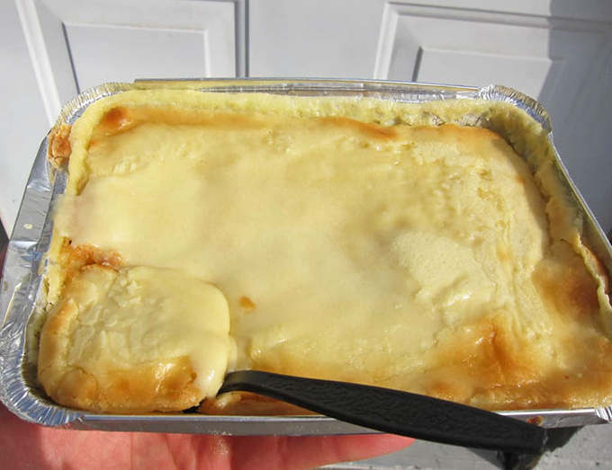 Behold the butter cake in its natural habitat – a simple aluminum pan that cradles what might be Pennsylvania's most comforting dessert.