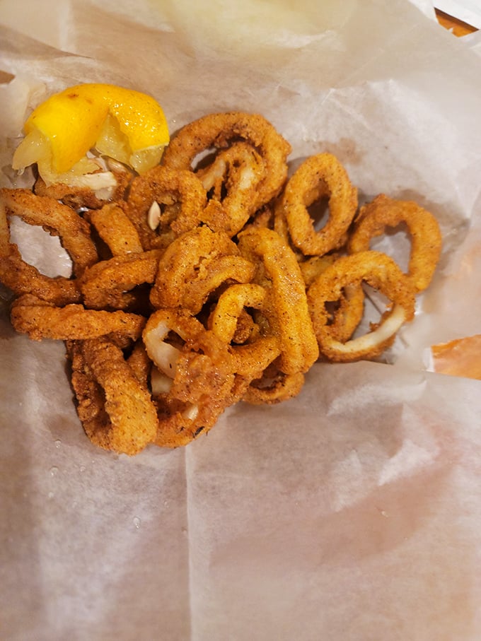 Calamari rings fried to perfection—the kind that convert skeptics into believers with just one crunchy, tender bite.