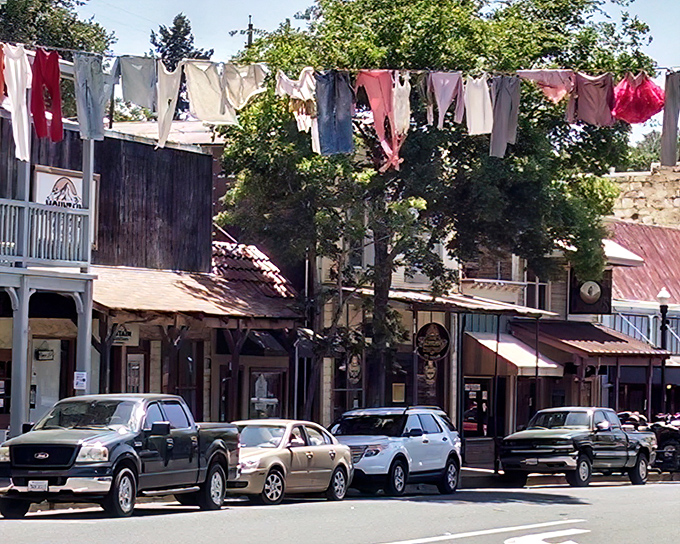 The weathered facades of downtown buildings tell stories of boom, bust, and resilience—architectural narrators of California's golden dreams.