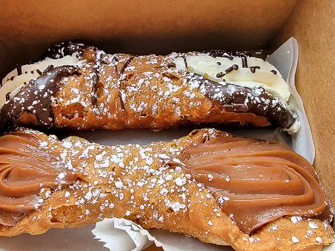 Golden-brown cannoli shells filled with heavenly cream - the pastry equivalent of hitting the jackpot in Vegas, but with better odds.