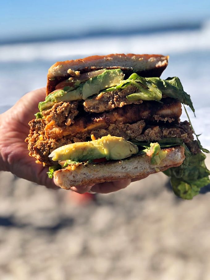 Beach-ready torta with layers of avocado and seasoned meat—the sandwich that makes you wonder why bread and meat ever bothered with other relationships.