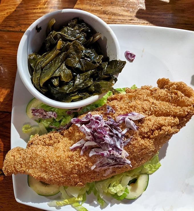 Cornmeal-crusted catfish that's traveled less distance to your plate than you did to the restaurant. The collard greens aren't just a side—they're a statement.