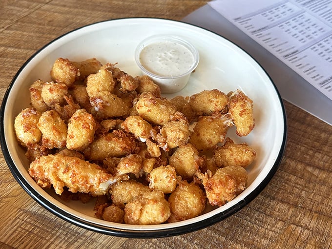 Cheese curds that squeak in your teeth and your heart—golden-fried little nuggets of joy that Wisconsin would approve of.