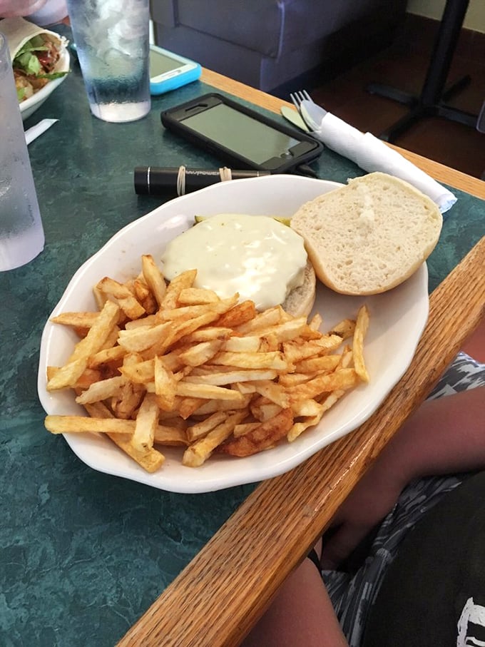 Golden fries surround what might be the perfect lunch—simple, honest food that reminds you why classics became classics in the first place.