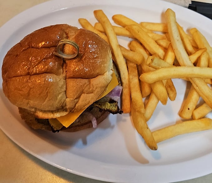 The classic American cheeseburger gets the New York Lunch treatment—unpretentious, perfectly grilled, and ready for its close-up.