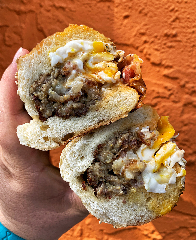 This isn't just a breakfast sandwich—it's morning salvation between bread. The kind of protein-packed start that makes Monday feel like Friday.