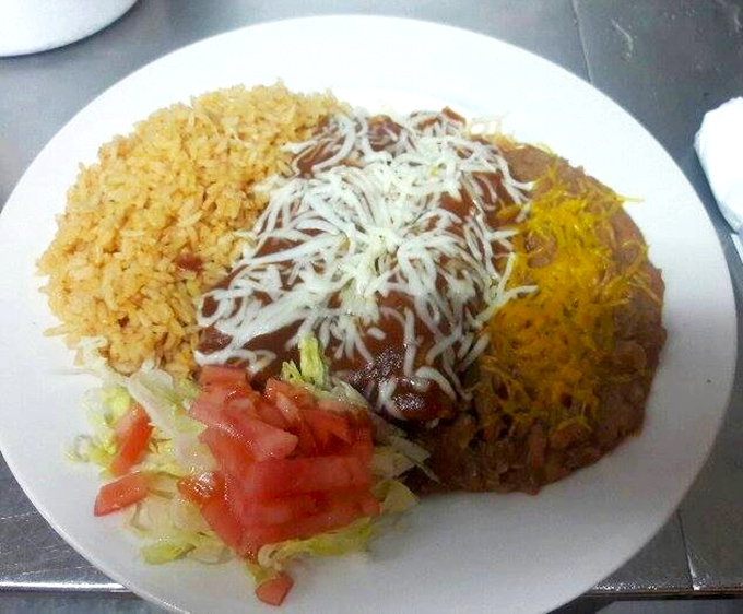 Rice, beans, cheese, and sauce in perfect harmony—like a mariachi band where every instrument hits the right note at the right time.