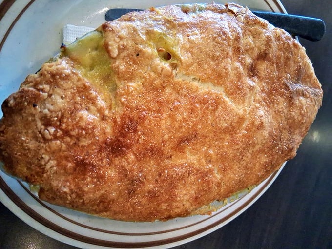 Golden, flaky crust hiding a savory treasure within. This chicken pot pie doesn't just comfort the soul—it gives it a warm bear hug.