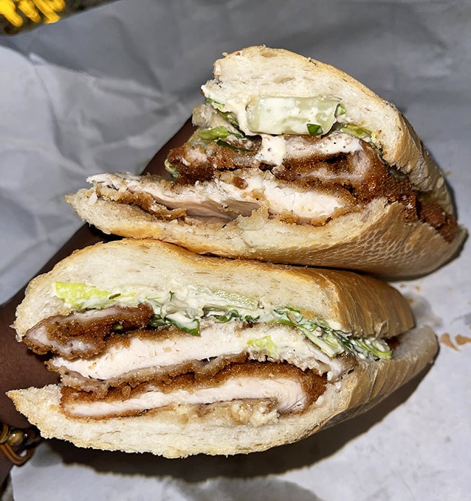 The chicken cutlet sandwich – where crispy meets tender in perfect harmony. This is the lunch that ruins all other lunches for the foreseeable future.