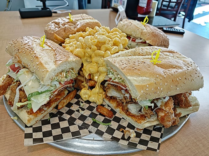 Sandwich royalty holding court. Four magnificent creations with mac and cheese as the throne's cushion—a feast fit for hungry Pocono adventurers.