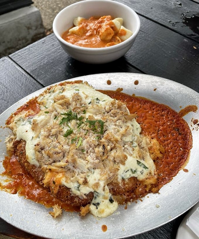This chicken parmesan isn't just dinner—it's edible architecture. Layers of crispy chicken, bubbling cheese, and vibrant sauce create the Taj Mahal of comfort food.