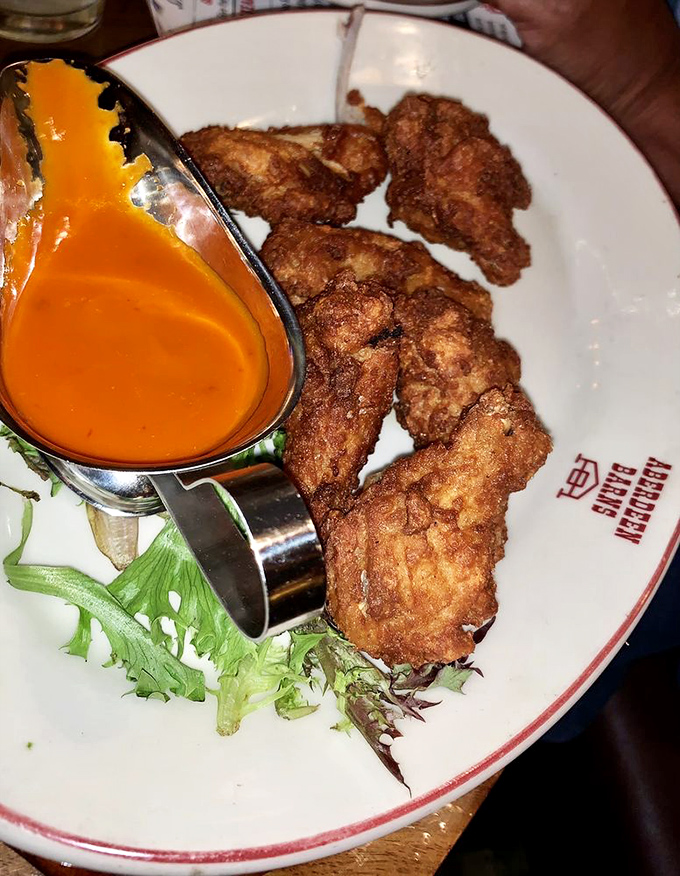 Crispy wings with that signature orange sauce—proof that steakhouses know their way around chicken too. Finger-licking isn't just allowed, it's expected.