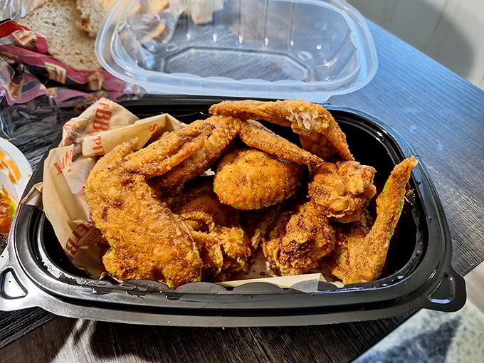 Golden-fried wings that crunch like autumn leaves. Proof that Arkins isn't just about low-and-slow—they've mastered the hot oil arts too.