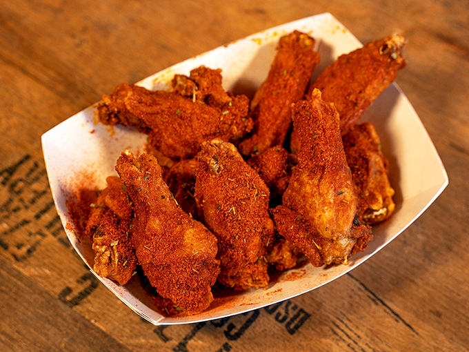 These wings aren't just crispy—they're life-affirming. The kind of deep orange-red that whispers, "You might need extra napkins, but it'll be worth it." 