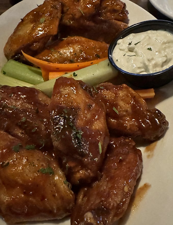 These aren't just wings – they're a sticky, glazed testament to how Irish pubs have embraced American classics while adding their own saucy interpretation.