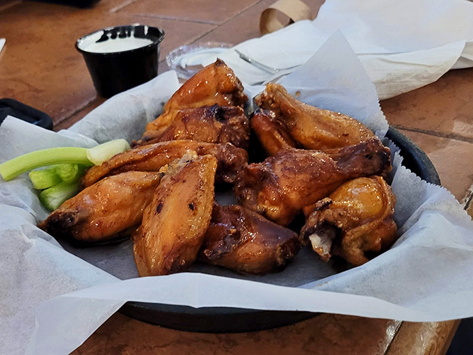 Wings that have gone through a smoke-then-fry transformation more impressive than any Hollywood makeover. Crispy outside, tender inside—the barbecue dream team.