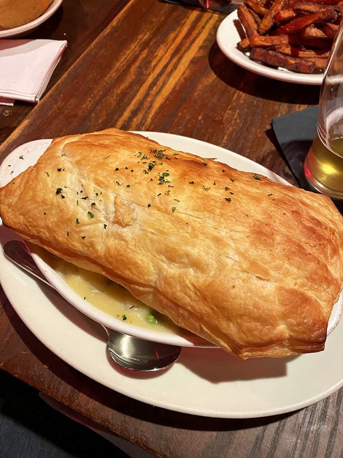 Not all heroes wear capes—some wear golden pastry. This chicken pot pie arrives like a puffed-up celebrity making a grand entrance.