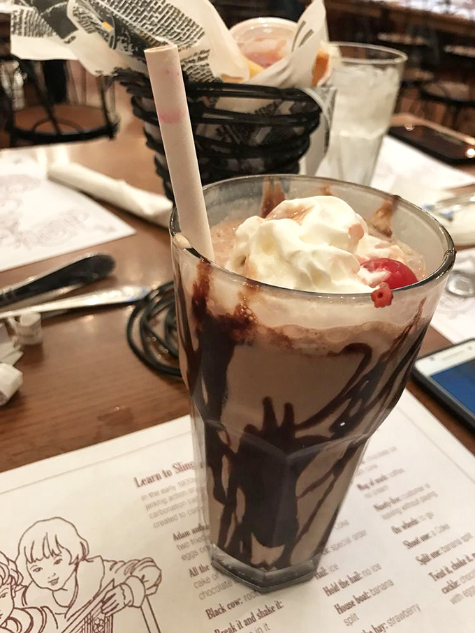 Chocolate malt dripping down the sides of the glass like a Jackson Pollock painting you can drink – with a cherry on top, naturally.
