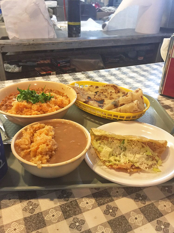 Rice and beans aren't just sides here—they're main characters in your meal's story. The chorizo adds the plot twist your taste buds never saw coming.