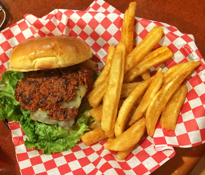 The burger that launched a thousand road trips. That crispy exterior gives way to juicy perfection inside—a textural masterpiece on a bun.