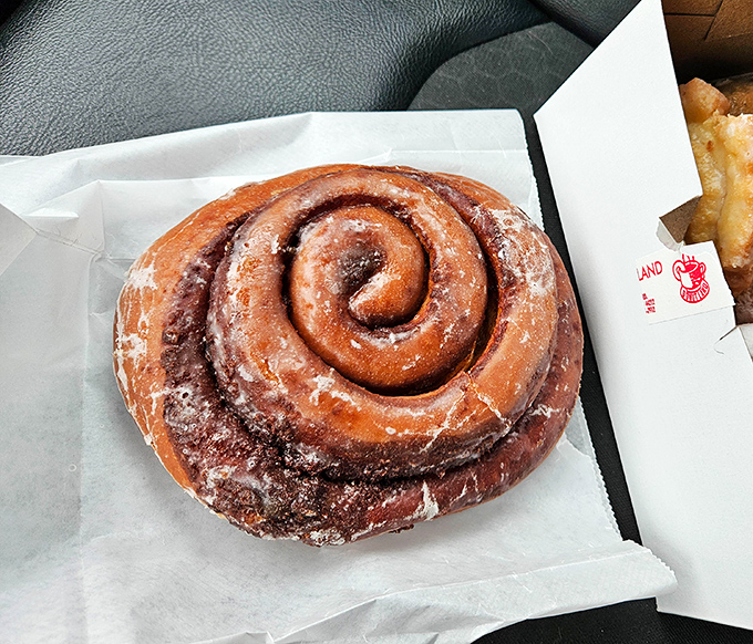 Cinnamon rolls spiraling like delicious DNA strands – this is evolution at its sweetest.