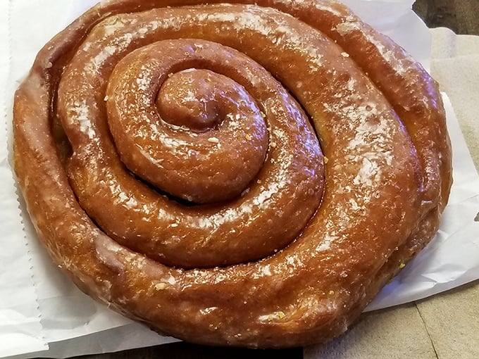 The cinnamon roll spiral hypnotizes with its golden swirls—resistance is futile, surrender is delicious.