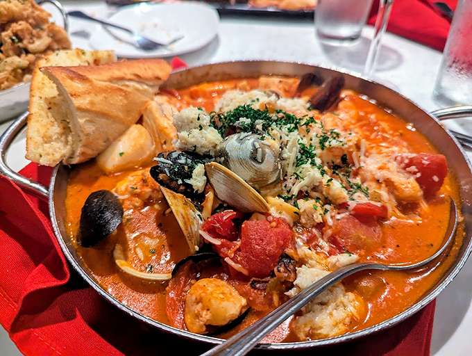 Cioppino: where tomatoes and seafood throw the best party in a bowl. This isn't soup—it's a maritime celebration with an invitation for crusty bread to dive in.