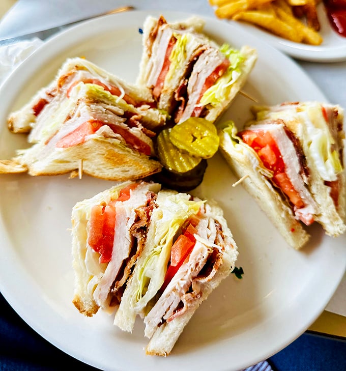 The club sandwich – architecture you can eat. Four perfect triangles arranged like they're posing for their yearbook photo.