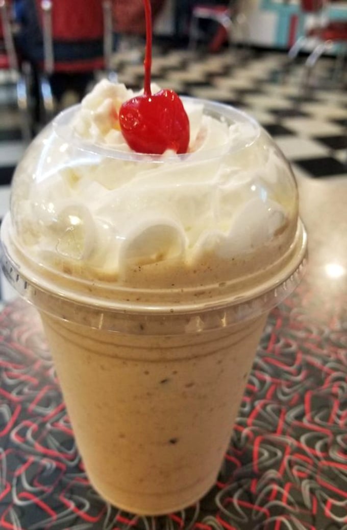 Topped with whipped cream and a cherry, this coffee milkshake doesn't just bring boys to the yard—it brings everyone to Lancaster.