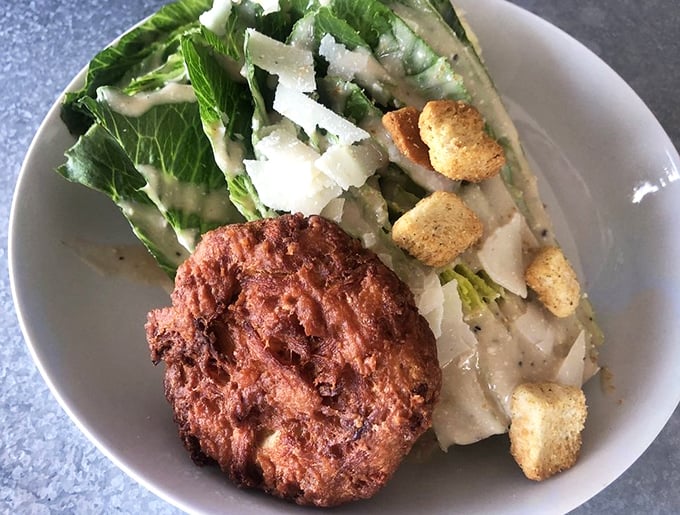 A proper Maryland crabcake—mostly crab, minimal filler, and absolutely zero apologies for being exactly what it should be.