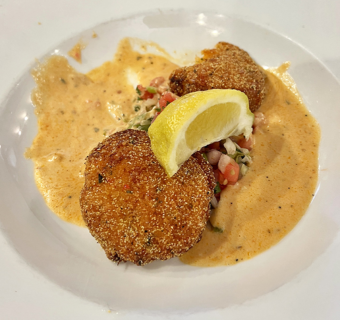 These crab cakes don't need a dramatic backstory – they speak for themselves with a crispy exterior and that heavenly habanero butter cream sauce.