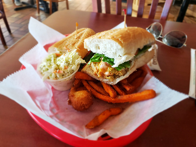 This isn't just a sandwich—it's architecture. Layers of crab cake, fresh vegetables, and sauce create a towering monument to Eastern Shore ingenuity.