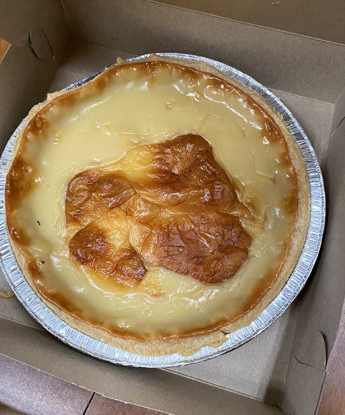 Cream pies with that golden-brown meringue peak—the kind your grandmother would slap your hand for touching before Sunday dinner.