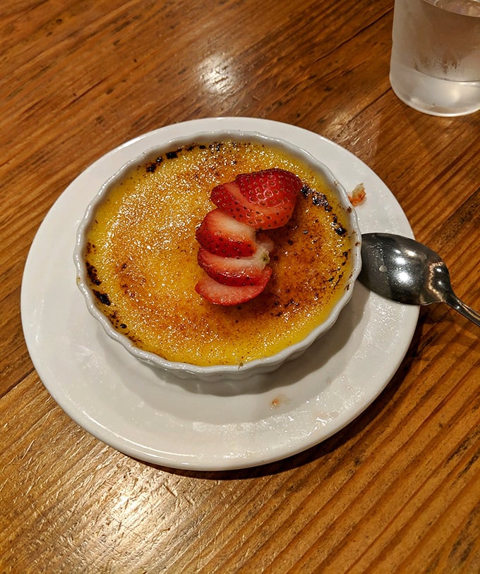 The crack of a perfect crème brûlée is nature's most satisfying sound—like walking on autumn leaves, but with sugar and cream.