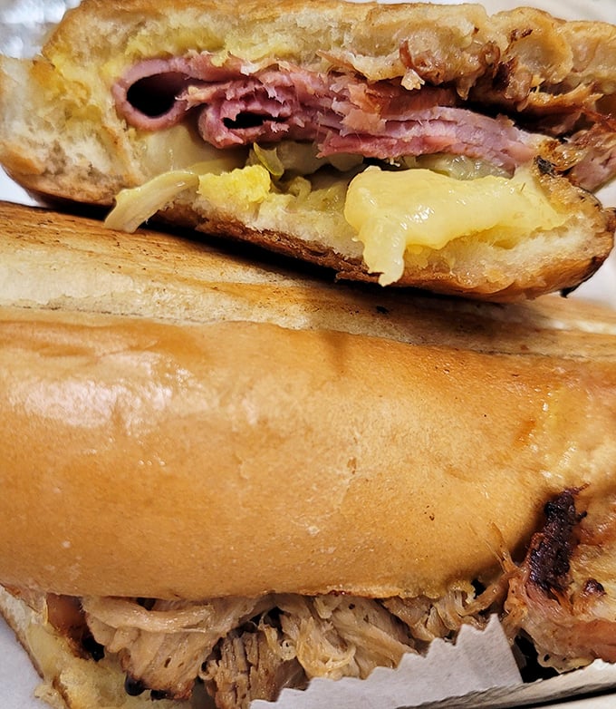 The Cuban sandwich that launched a thousand return visits—pressed to perfection with layers that tell a delicious story.