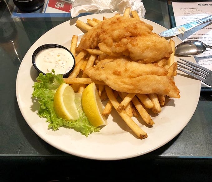 Golden-battered fish and chips that crackle when you bite them—the kind that make you wonder why anyone would ever eat frozen fish sticks again.