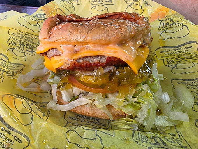 Layer upon layer of goodness—this burger doesn't just satisfy hunger, it creates memories with every perfectly constructed bite.