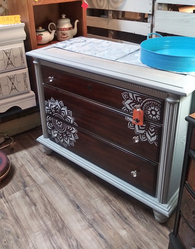 This two-tone dresser with mandala details bridges vintage bones with contemporary flair—furniture that's lived multiple lives and ready for another.