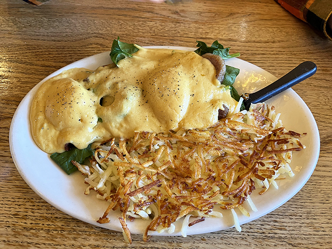 Eggs Benedict that makes you understand why people wait in line on Sunday mornings—hollandaise sauce cascading like a yellow waterfall of happiness.